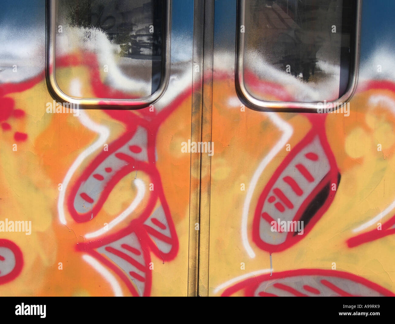 train carriage and doors covered with graffiti Stock Photo - Alamy