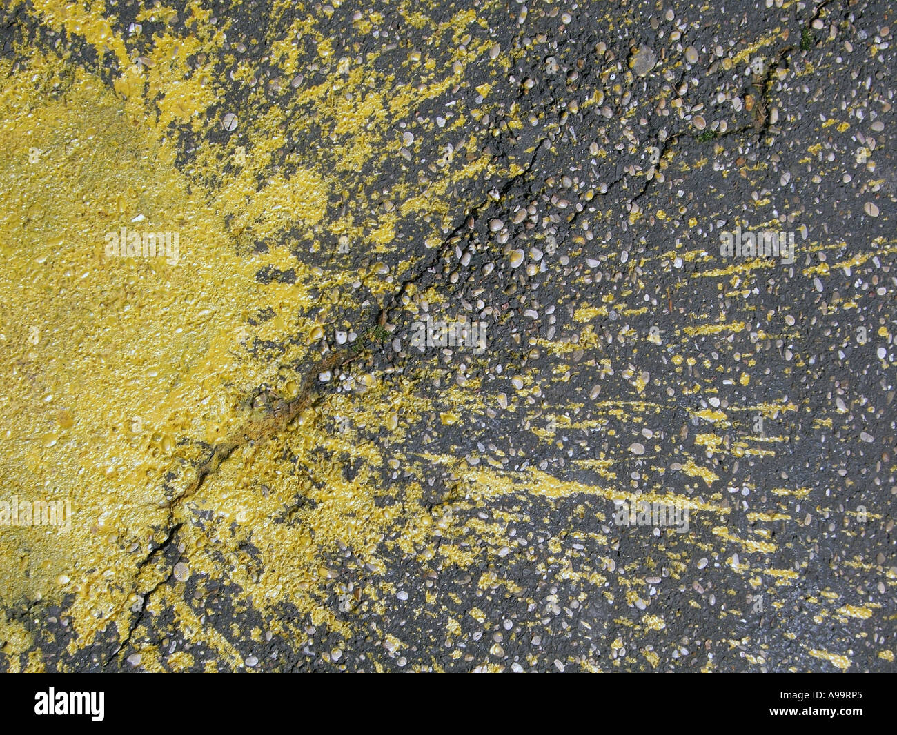 yellow paint spilled on road Stock Photo - Alamy