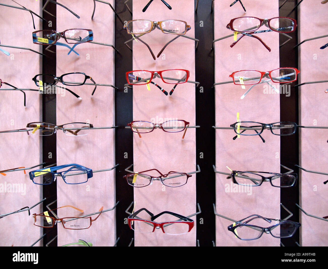 collection of modern coloured spectacles frames by optician Stock Photo ...