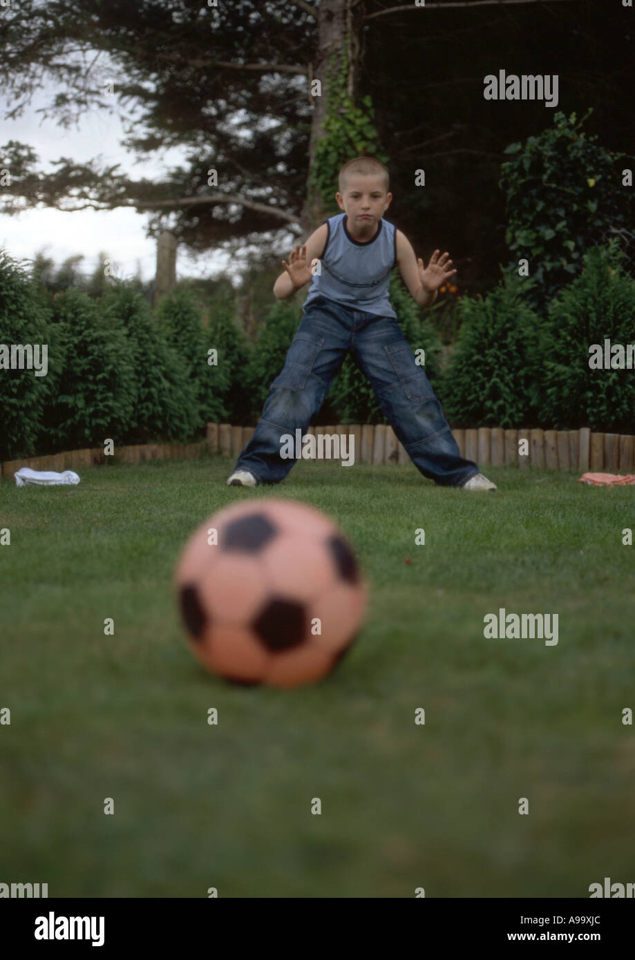 boy as goalkeeper getting ready for penalty kick Stock Photo - Alamy