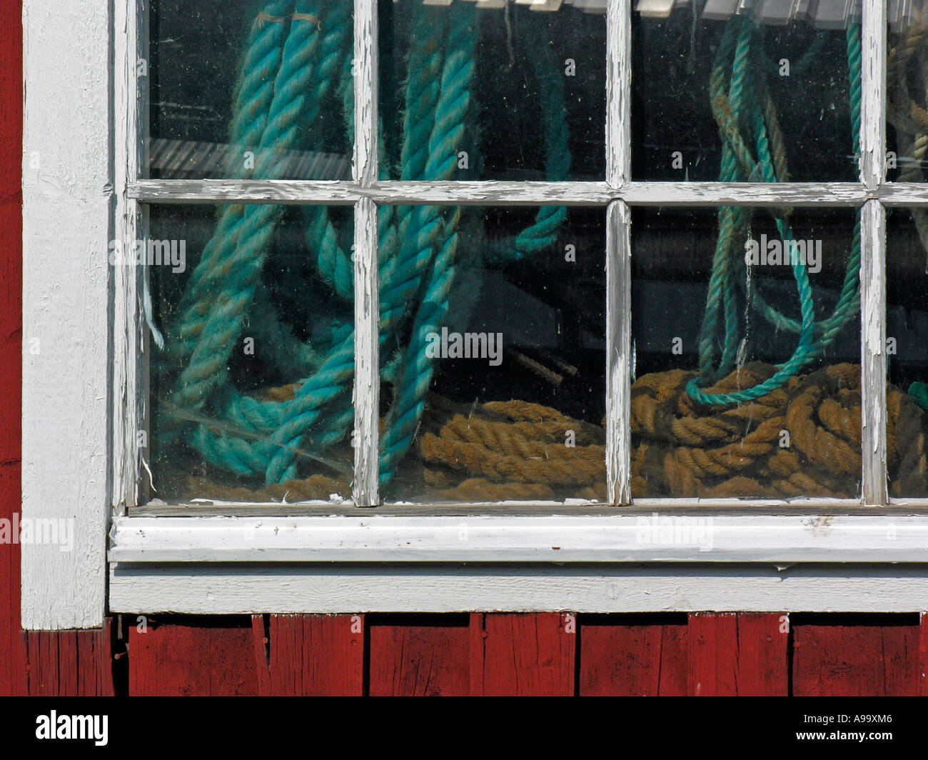 ropes at window of a red boathouse Stock Photo - Alamy