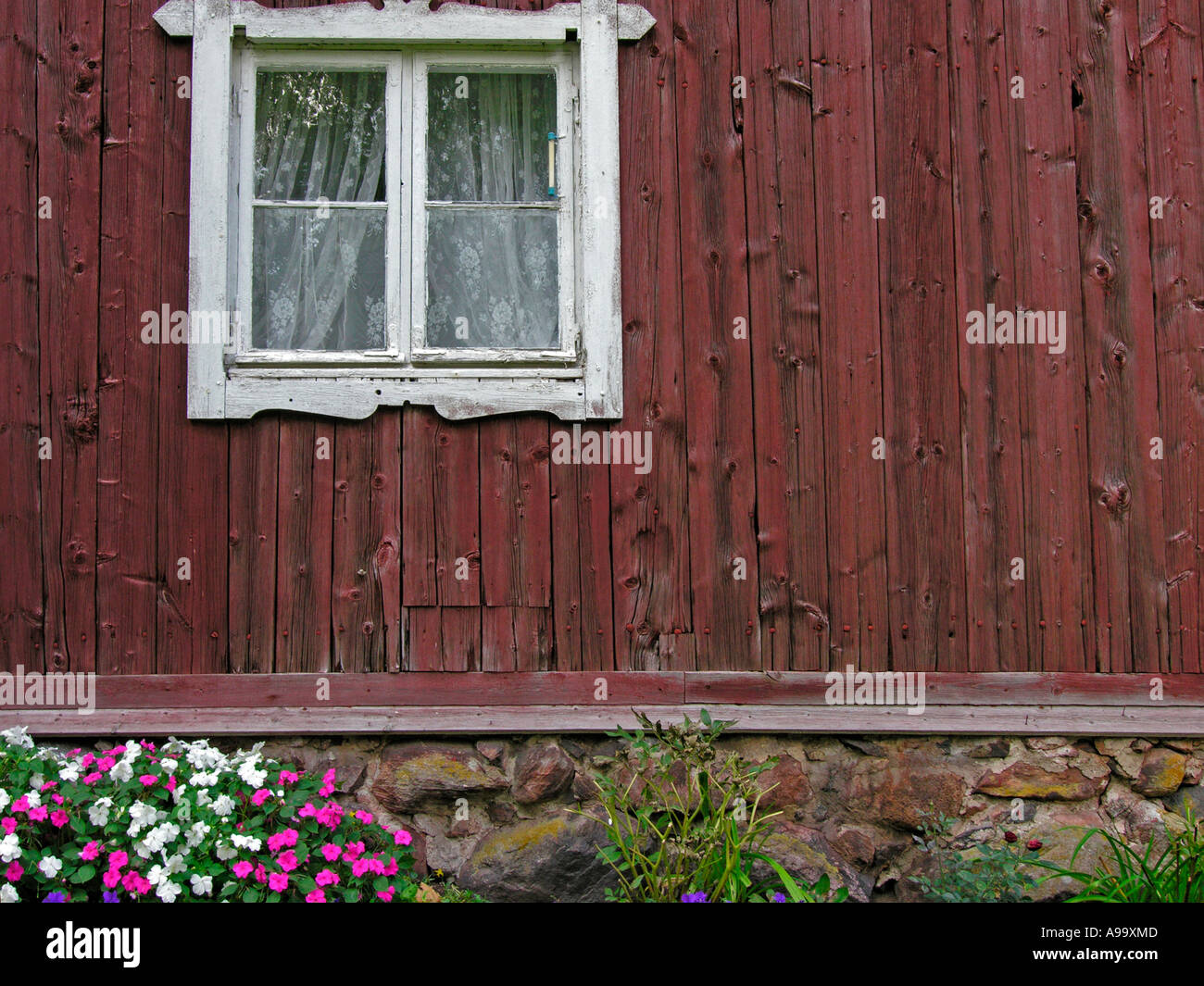 window of an old red skandinavian timber house blockhouse Stock Photo ...