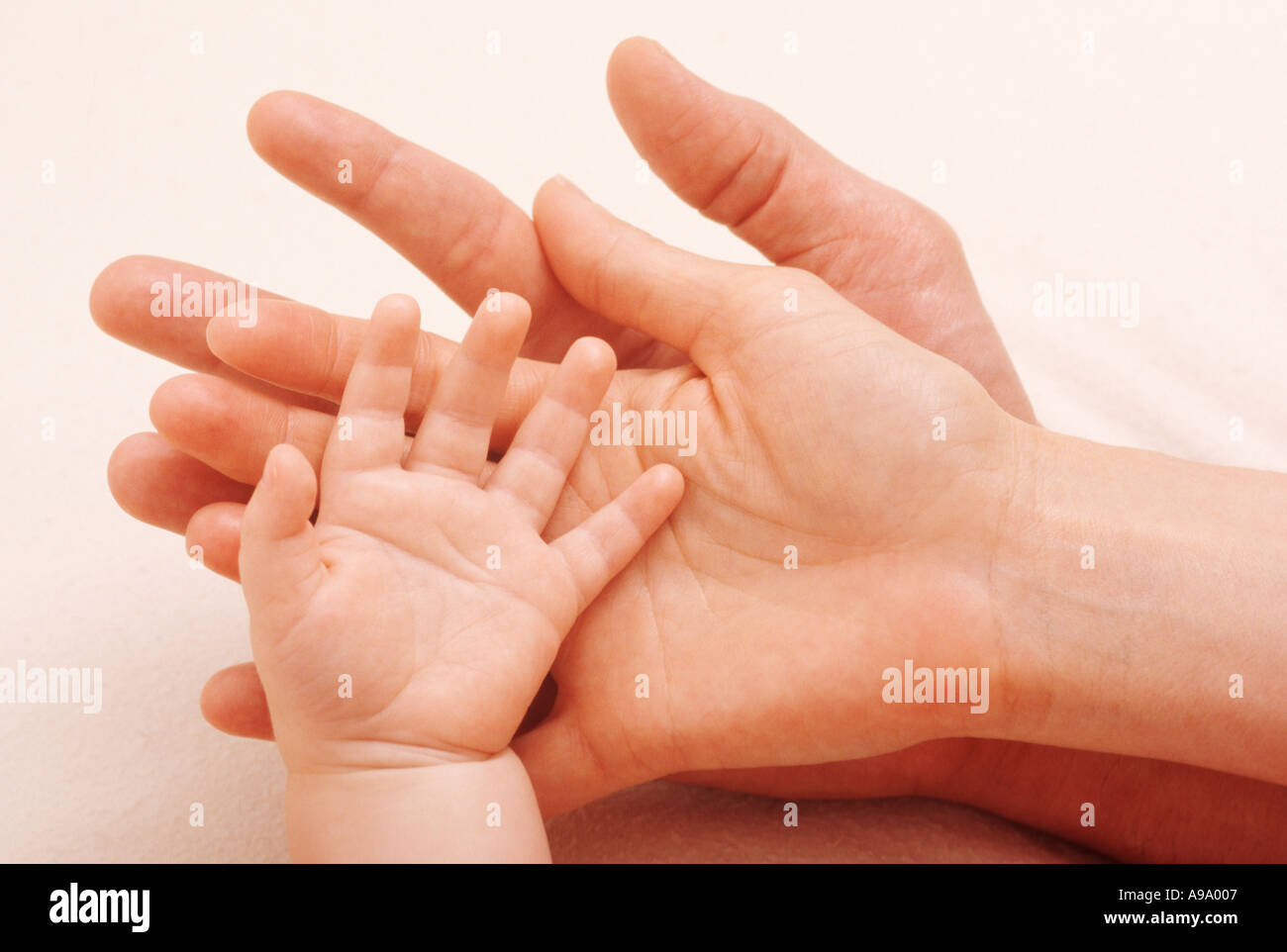 parent hands and baby hand Stock Photo - Alamy