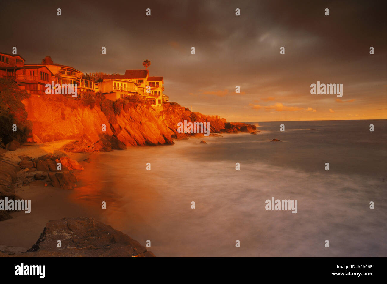 Coastal homes at Woods Cove in Laguna Beach in sunset light Southern ...