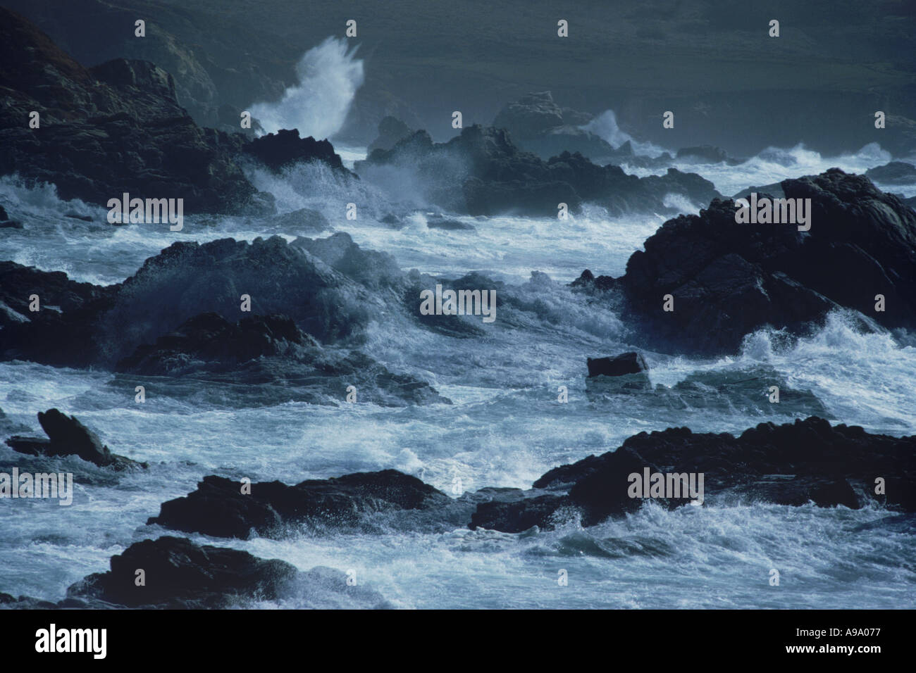Breaking wave waves rocky shore surf hi-res stock photography and ...