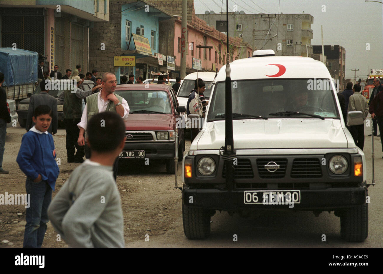 Silopi, TURKEY -- Cars belonging to the Turkish Red Crescent line up on ...