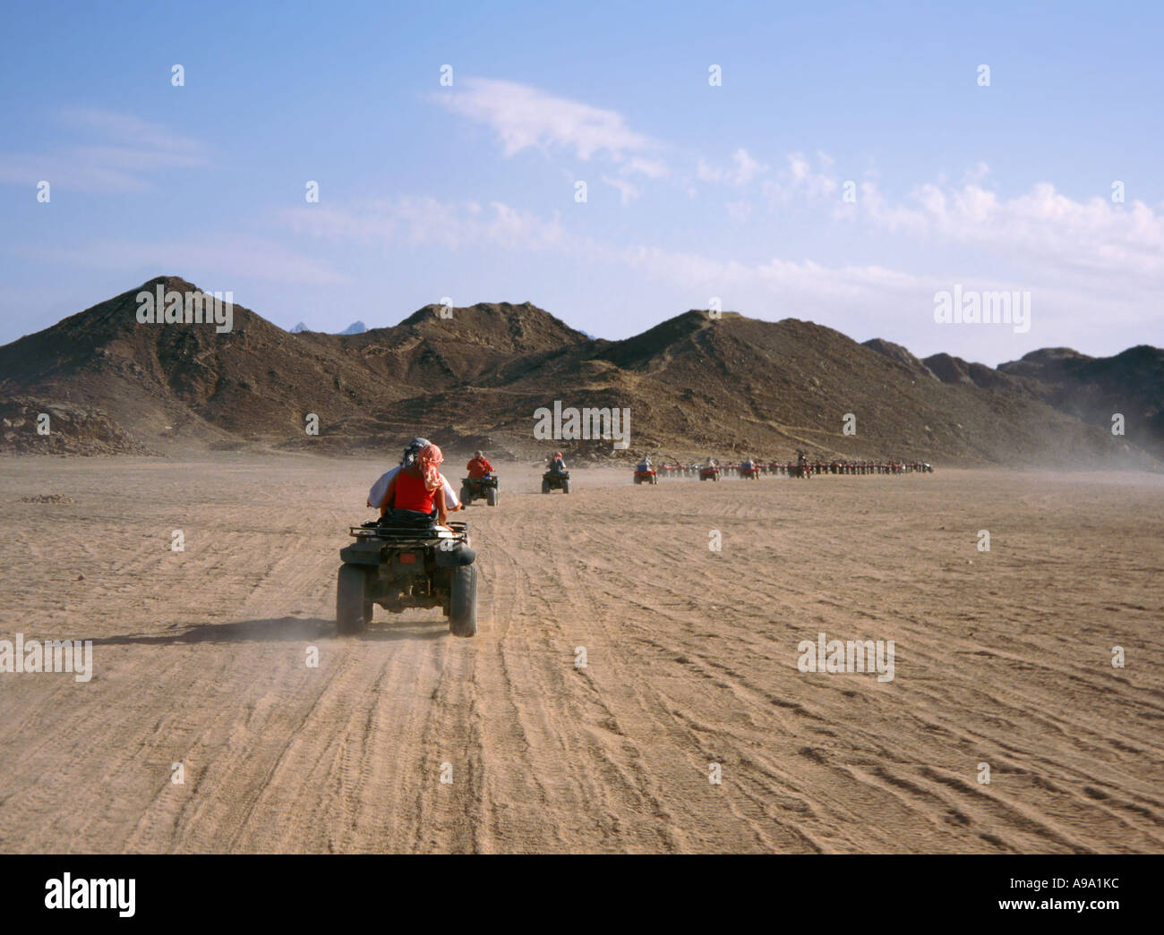 Tourist riding go carts at egyptian desert Stock Photo - Alamy