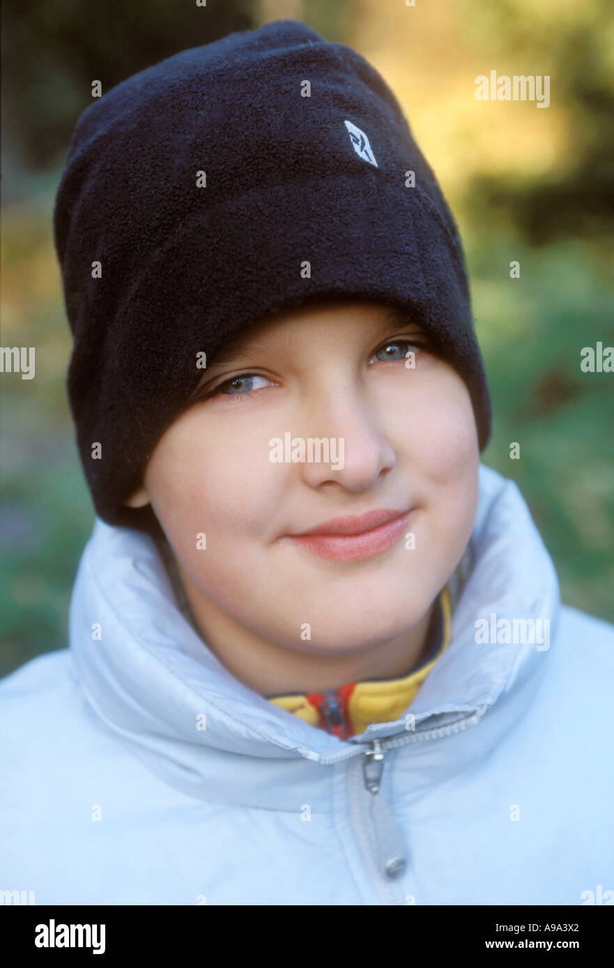 Boy in hat portrait Stock Photo - Alamy