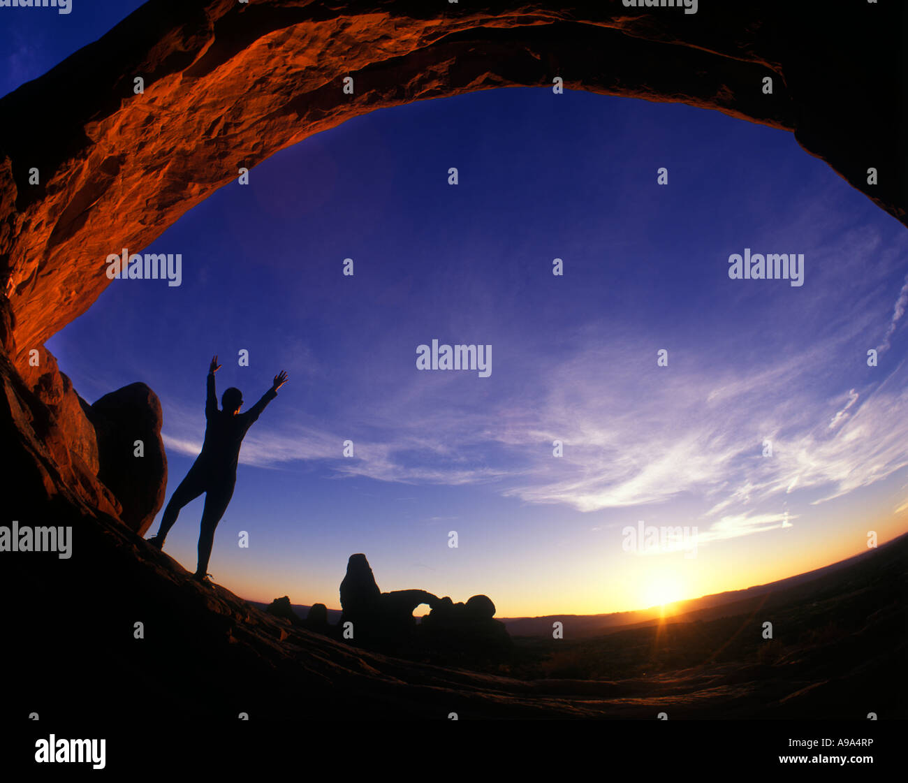 WOMAN WITH RAISED ARMS NORTH WINDOW ARCH LOOKING AT TURRET ARCH ARCHES ...