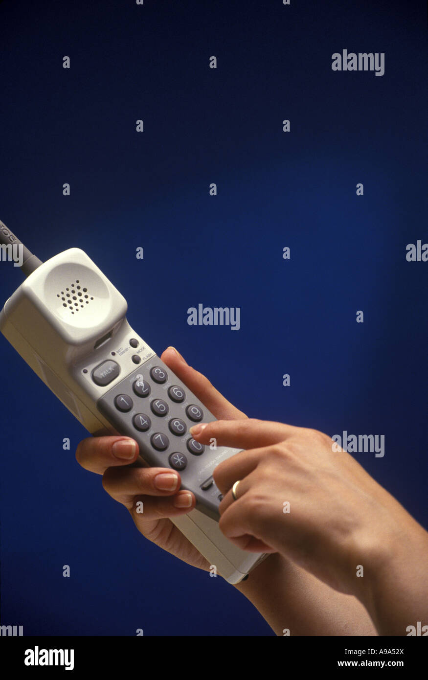 WOMAN'S HANDS DIALING TELEPHONE Stock Photo - Alamy
