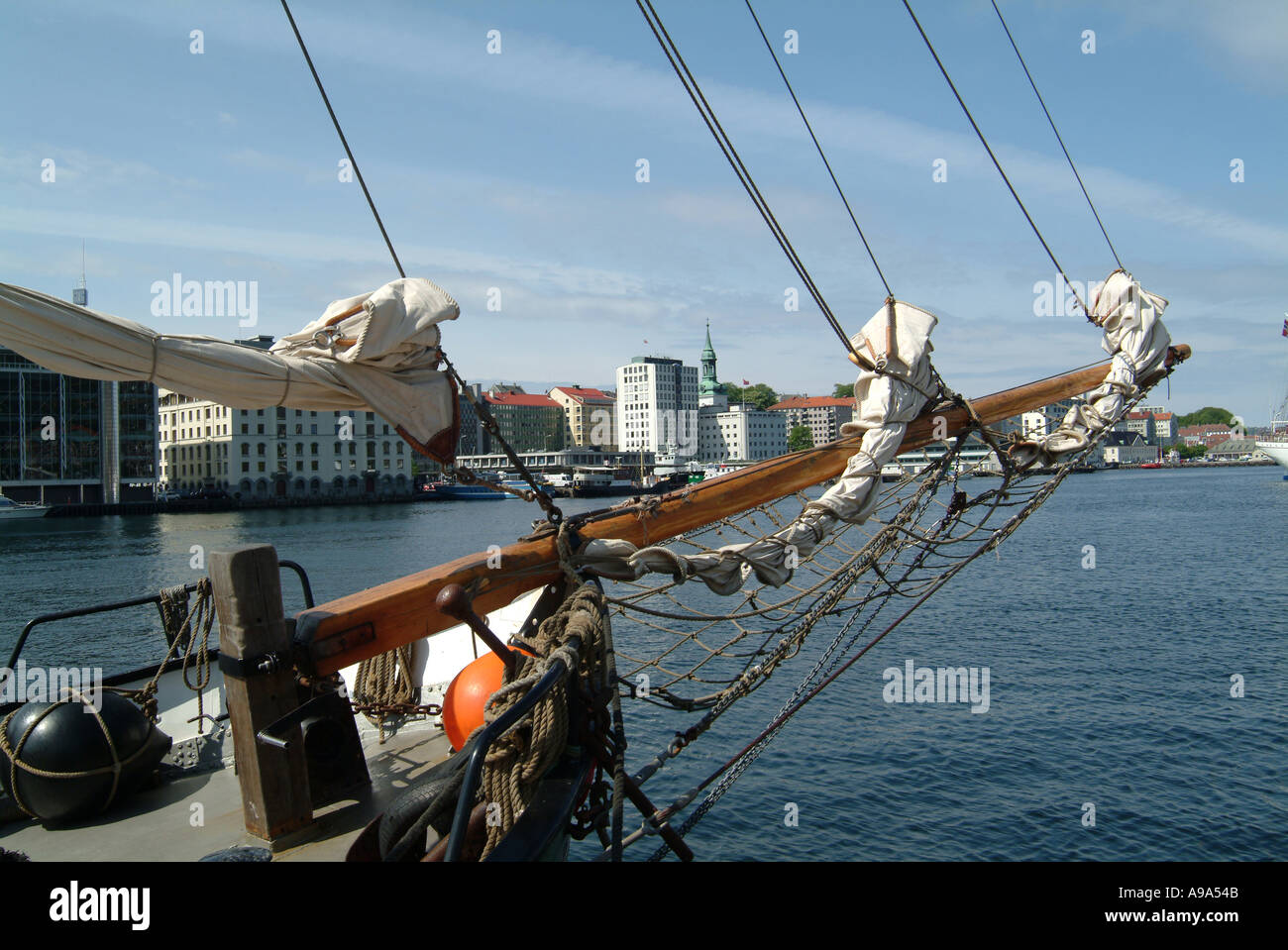 View of part of Bergen Harbour through Boat Rigging Stock Photo - Alamy
