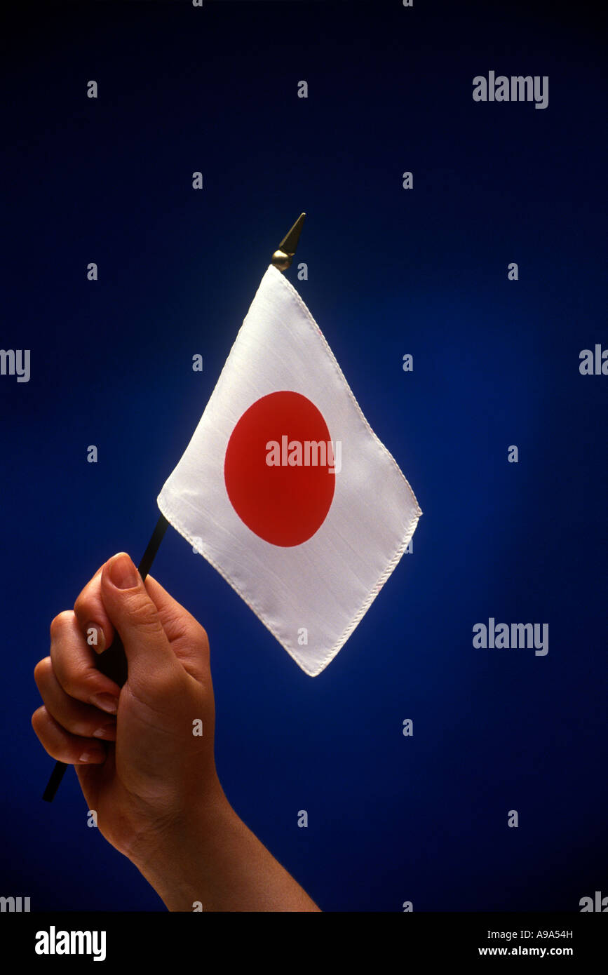 Holding japanese flag hi-res stock photography and images - Alamy