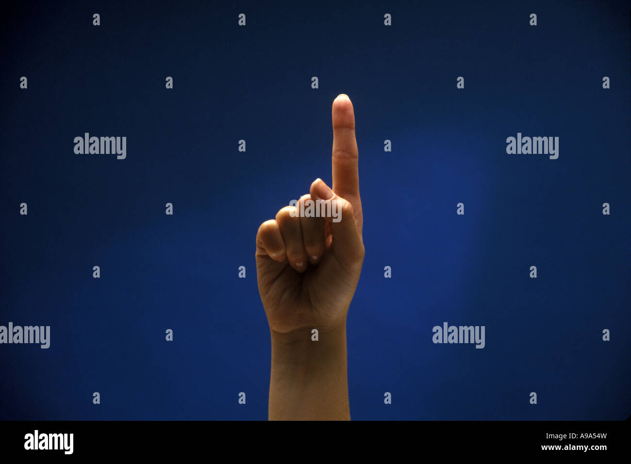 WOMANS HAND POINTING UP Stock Photo - Alamy
