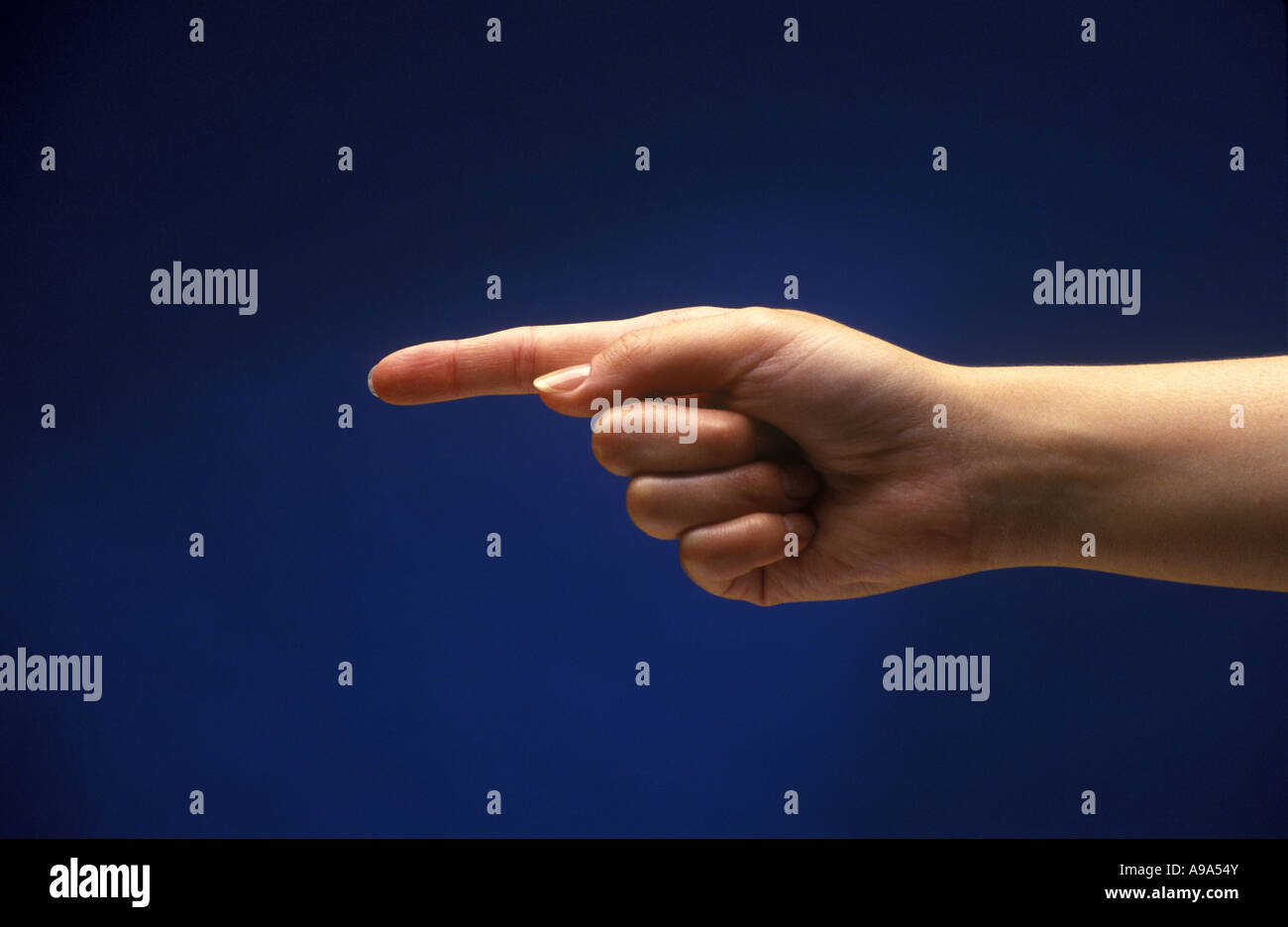 WOMANS HAND POINTING SIDEWAYS LEFT Stock Photo - Alamy