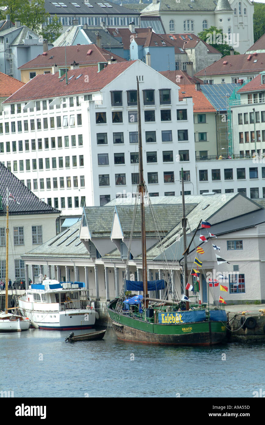 Cafe Boat alongside Pier in Bergen Harbour Stock Photo - Alamy