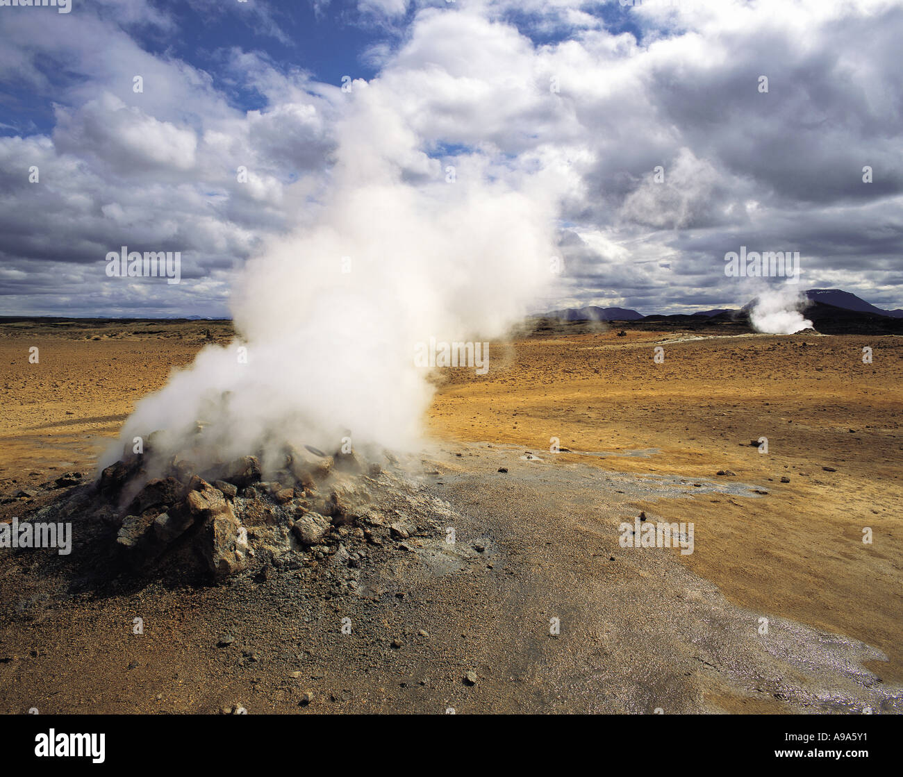 Geothermal landscape at Myvatn northern Iceland with smoking fumaroles ...