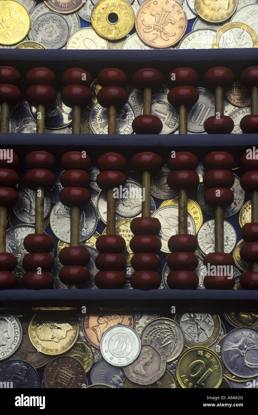 CHINESE ABACUS COUNTING FRAME OVER NATIONAL COINS Stock Photo - Alamy