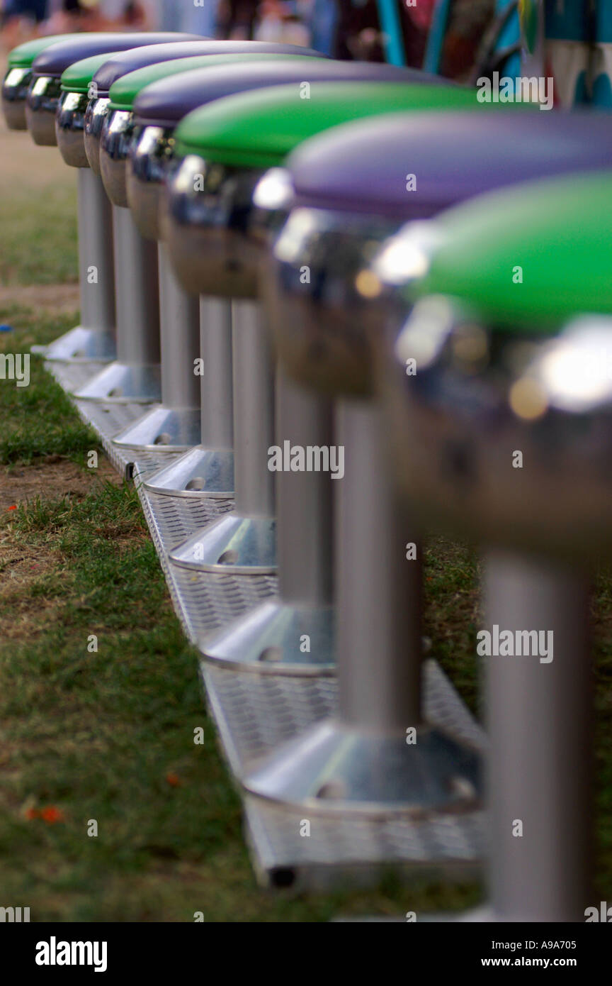 carnival stools line green colorful seats chairs fairgrounds amusement ...