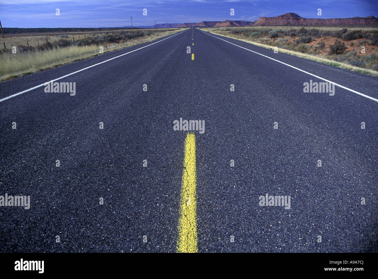 SINGLE YELLOW LINE EMPTY ROAD ROUTE 89 NORTH ARIZONA USA Stock Photo ...