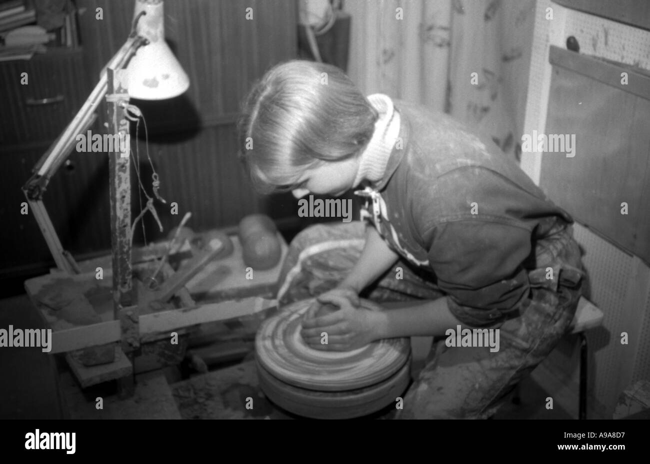 young girl potter makes pottery at cluny pottery workshop bourgogne ...