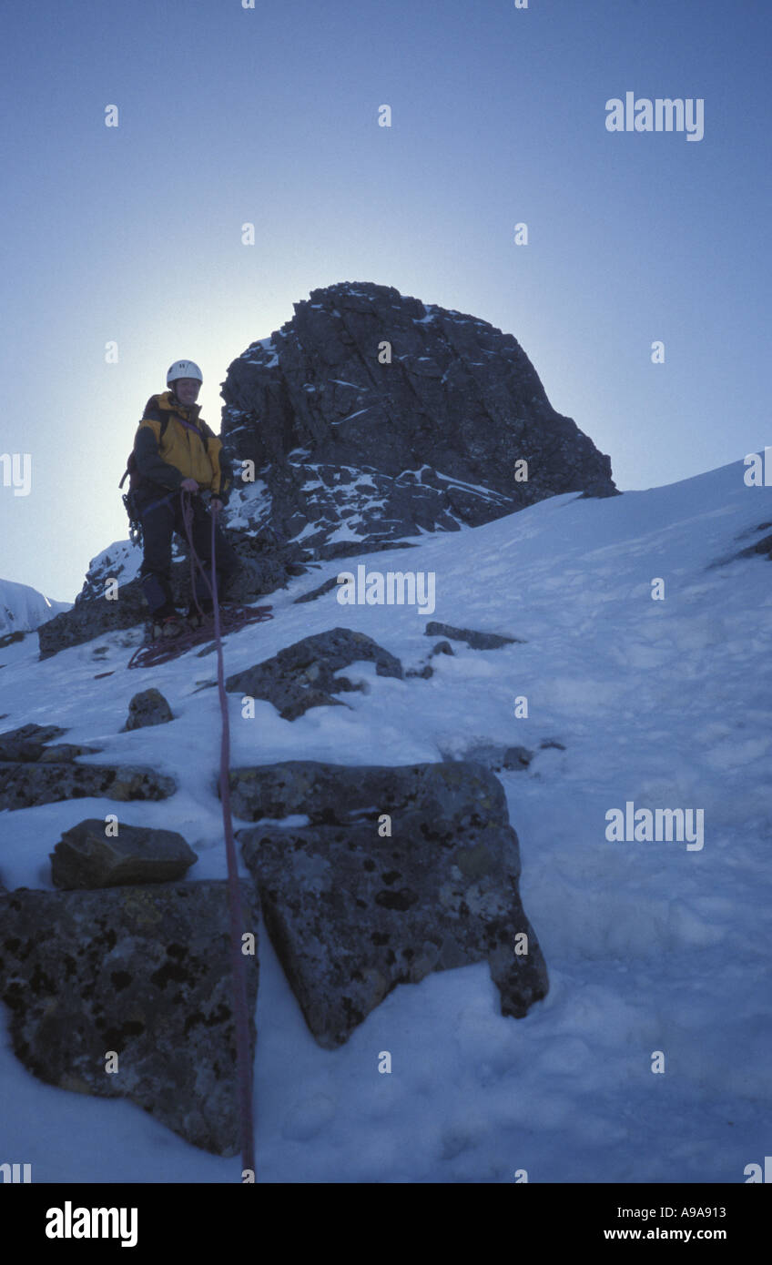 Climber on Tower Ridge Ben Nevis in winter Highlands Scotland Stock ...