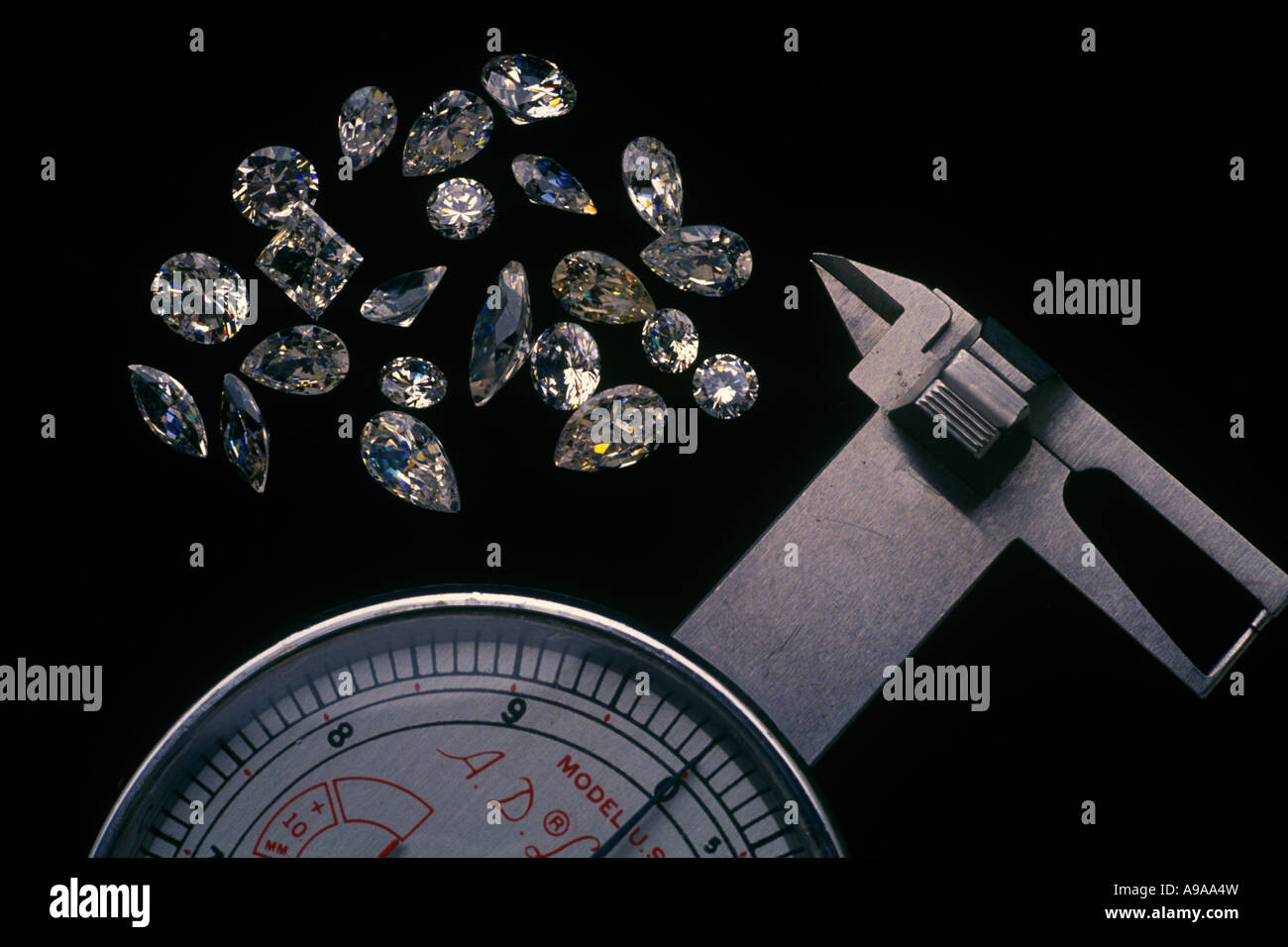 LARGE DIAMONDS JEWELERS MEASURING TOOLS ON PLAIN BLACK BACKGROUND Stock ...