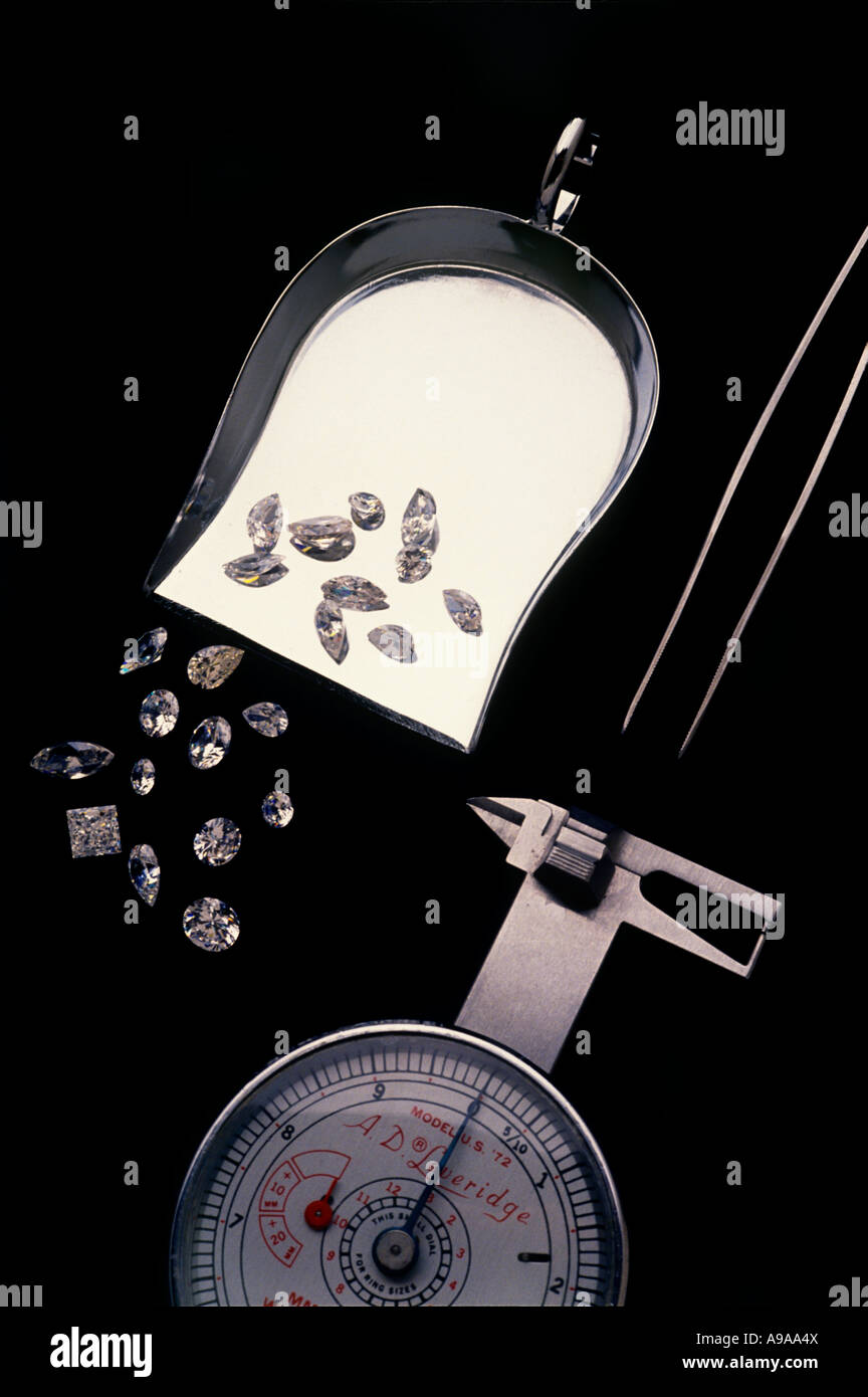 LARGE DIAMONDS JEWELERS TOOLS ON PLAIN BLACK BACKGROUND Stock Photo - Alamy