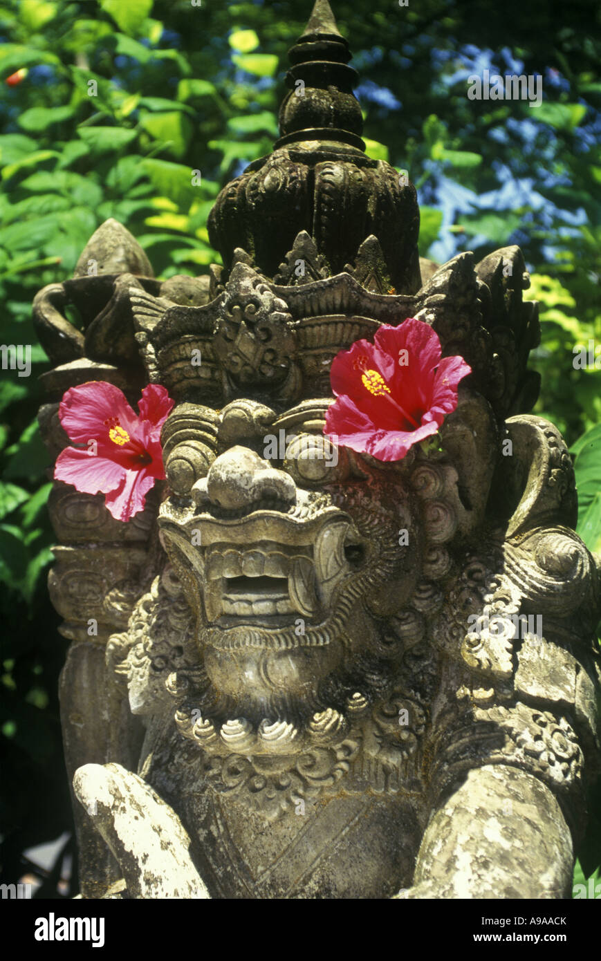 FACE OF STONE TEMPLE GUARD BUDDHIST TEMPLE BALI INDONESIA Stock Photo ...