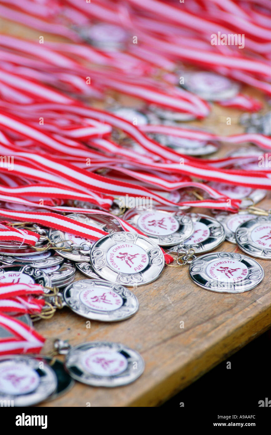 Medals on table for primary school funrun nr London UK Stock Photo - Alamy