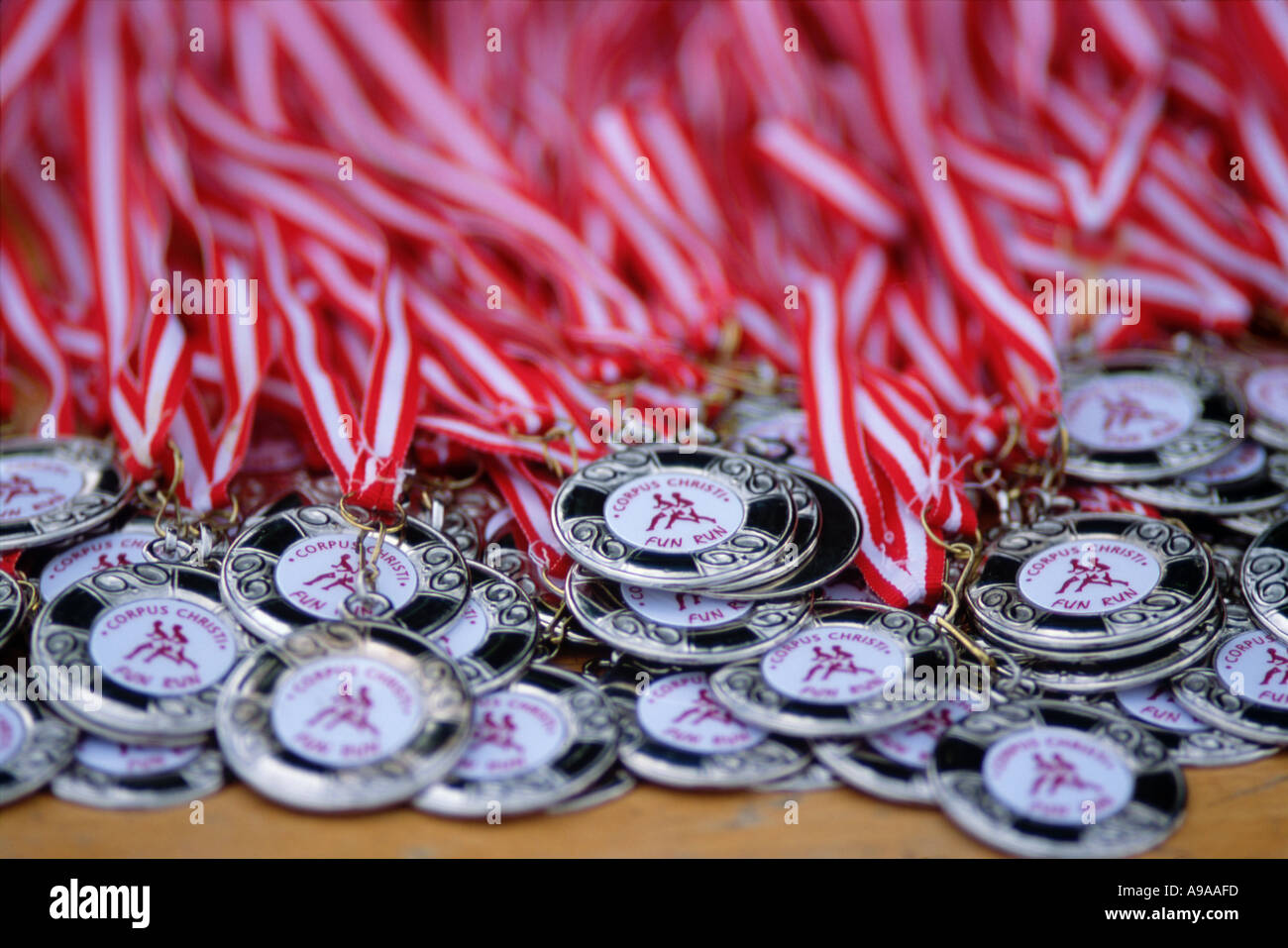 Medals on table for primary school funrun nr London UK Stock Photo - Alamy