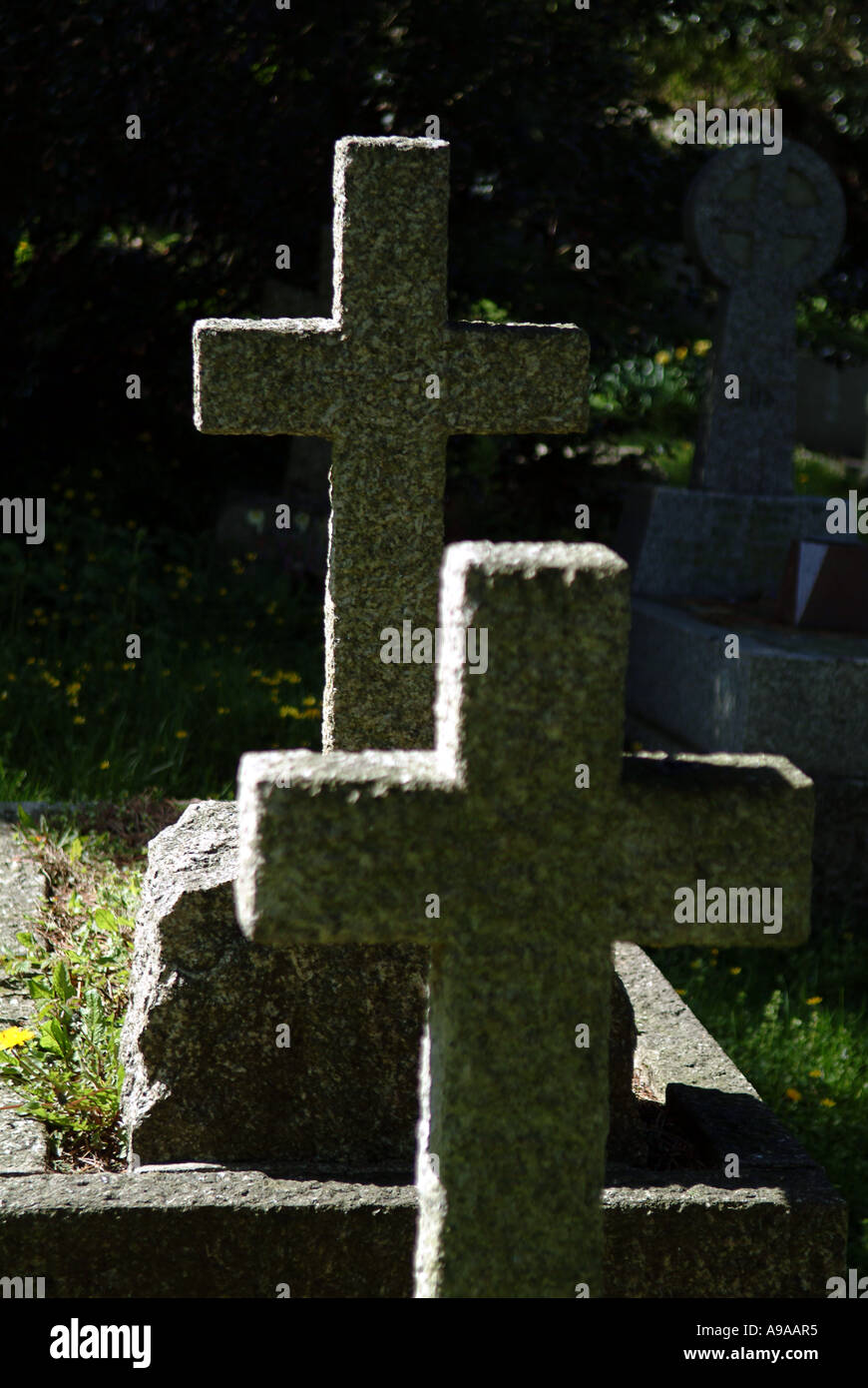 Stone crosses in a churchyard Stock Photo - Alamy