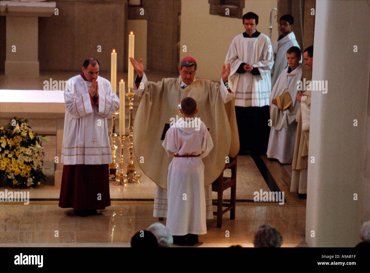 Priest catholic church end mass hi-res stock photography and images - Alamy