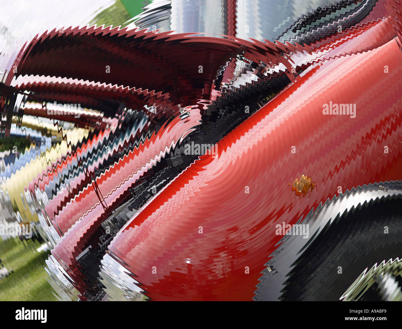 Minis lined up with their bonnets up at the motor racing circuit near ...