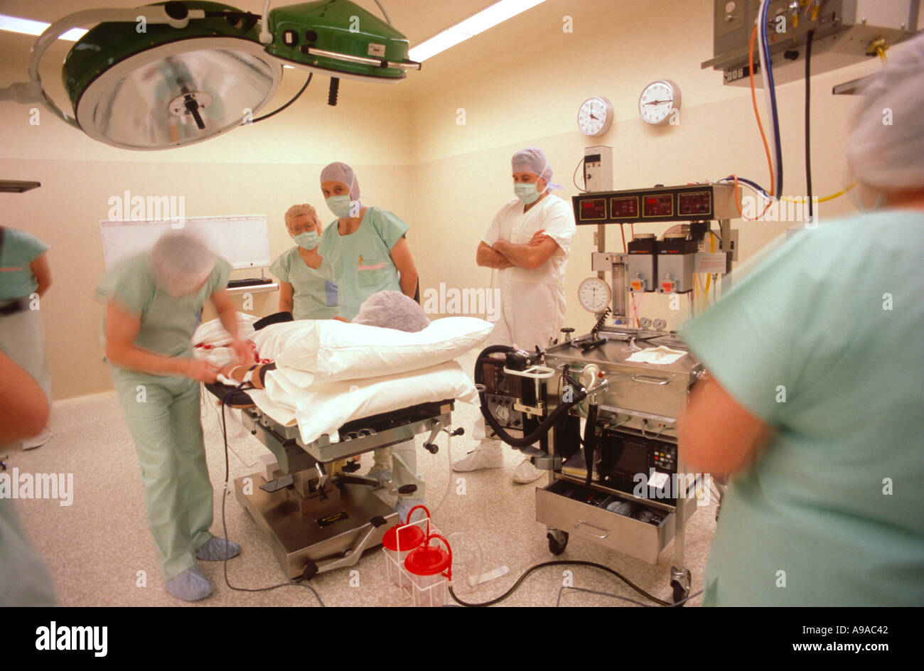 preparing patient in operating theatre for general surgery operation ...