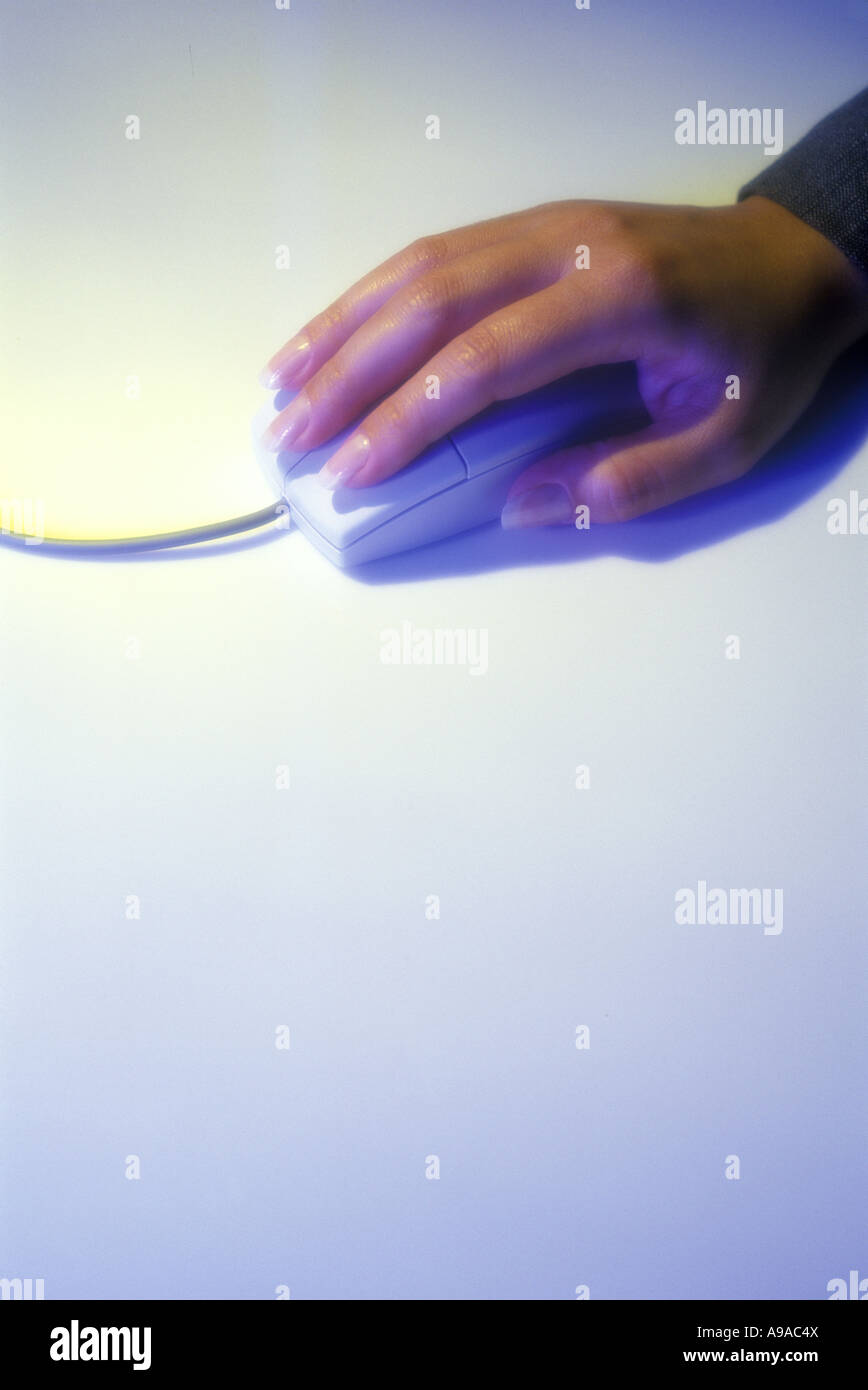 WOMANS HAND HOLDING PERSONAL COMPUTER MOUSE Stock Photo - Alamy