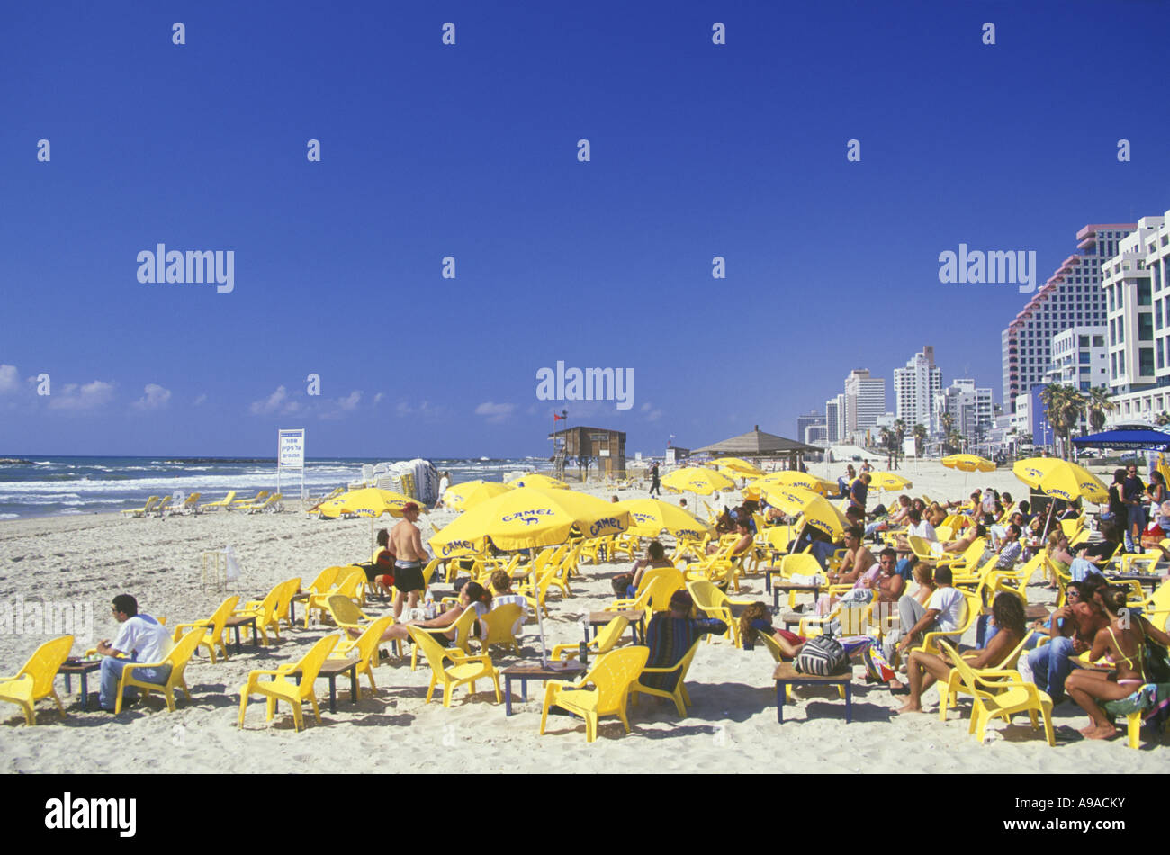 YELLOW BEACH CLUB UMBRELLAS WATERFRONT TEL AVIV ISRAEL Stock Photo - Alamy