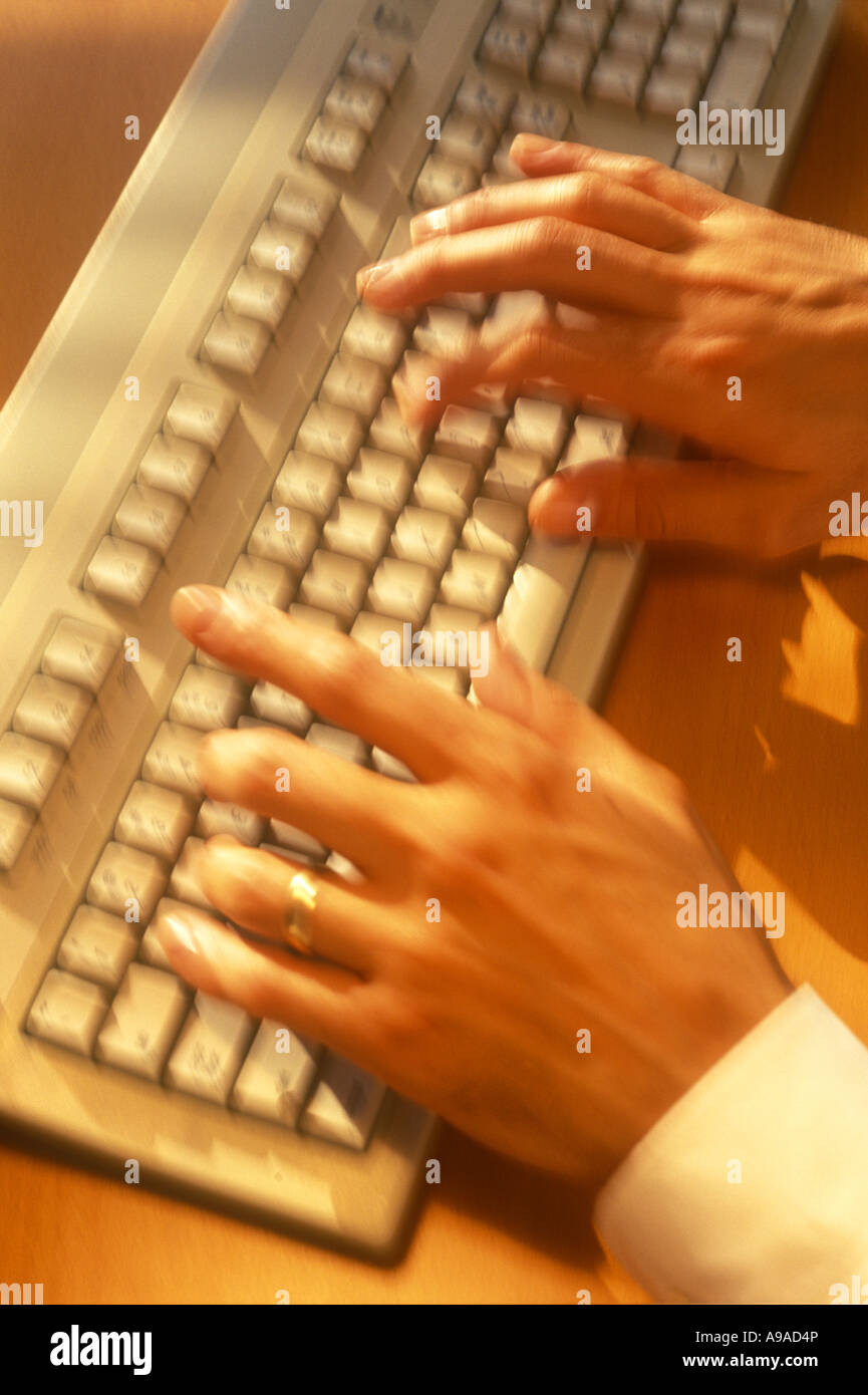 MANS HANDS ON COMPUTER KEYBOARD Stock Photo - Alamy