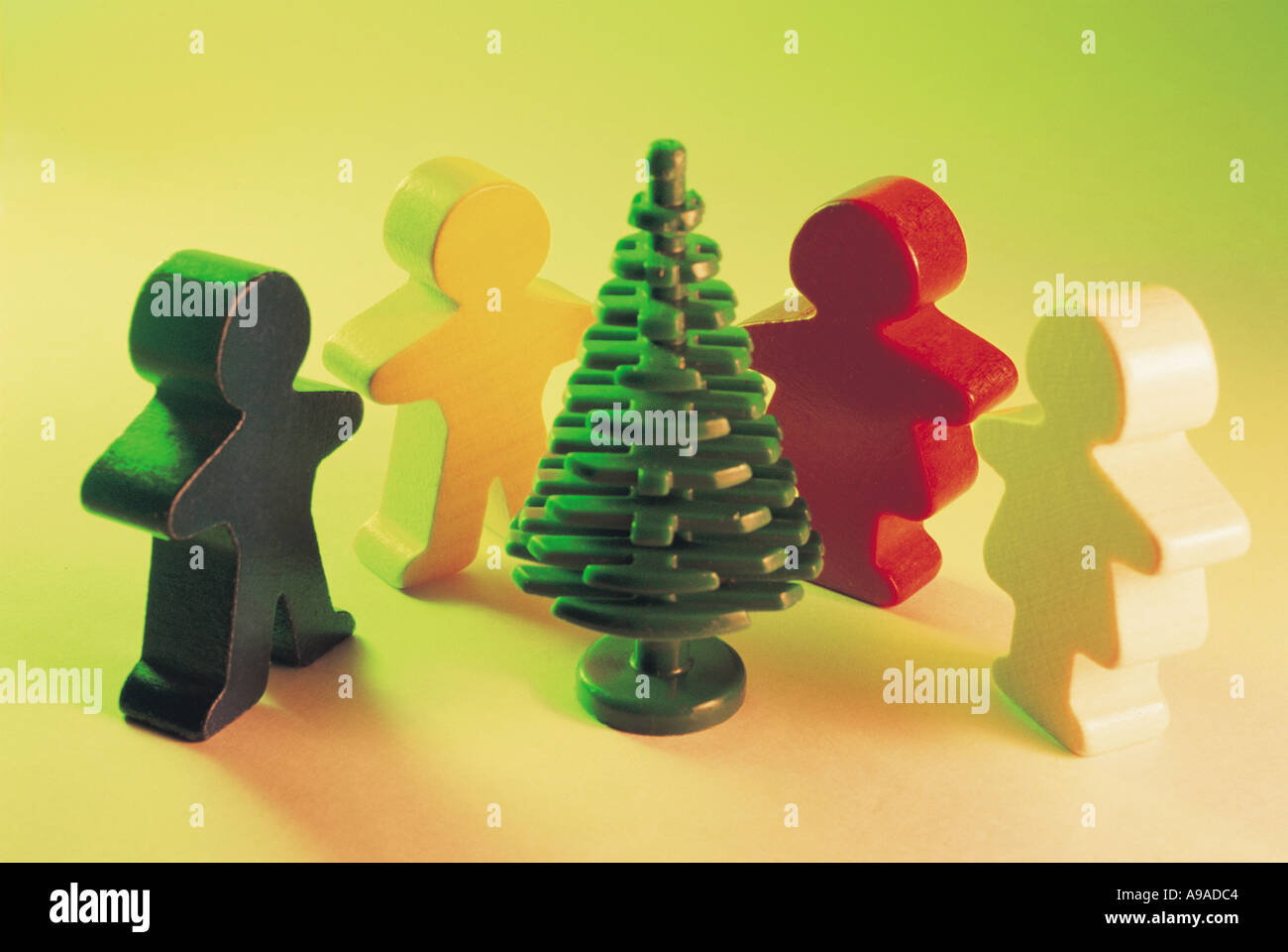 Wooden Children Figures with Miniature Tree Stock Photo - Alamy