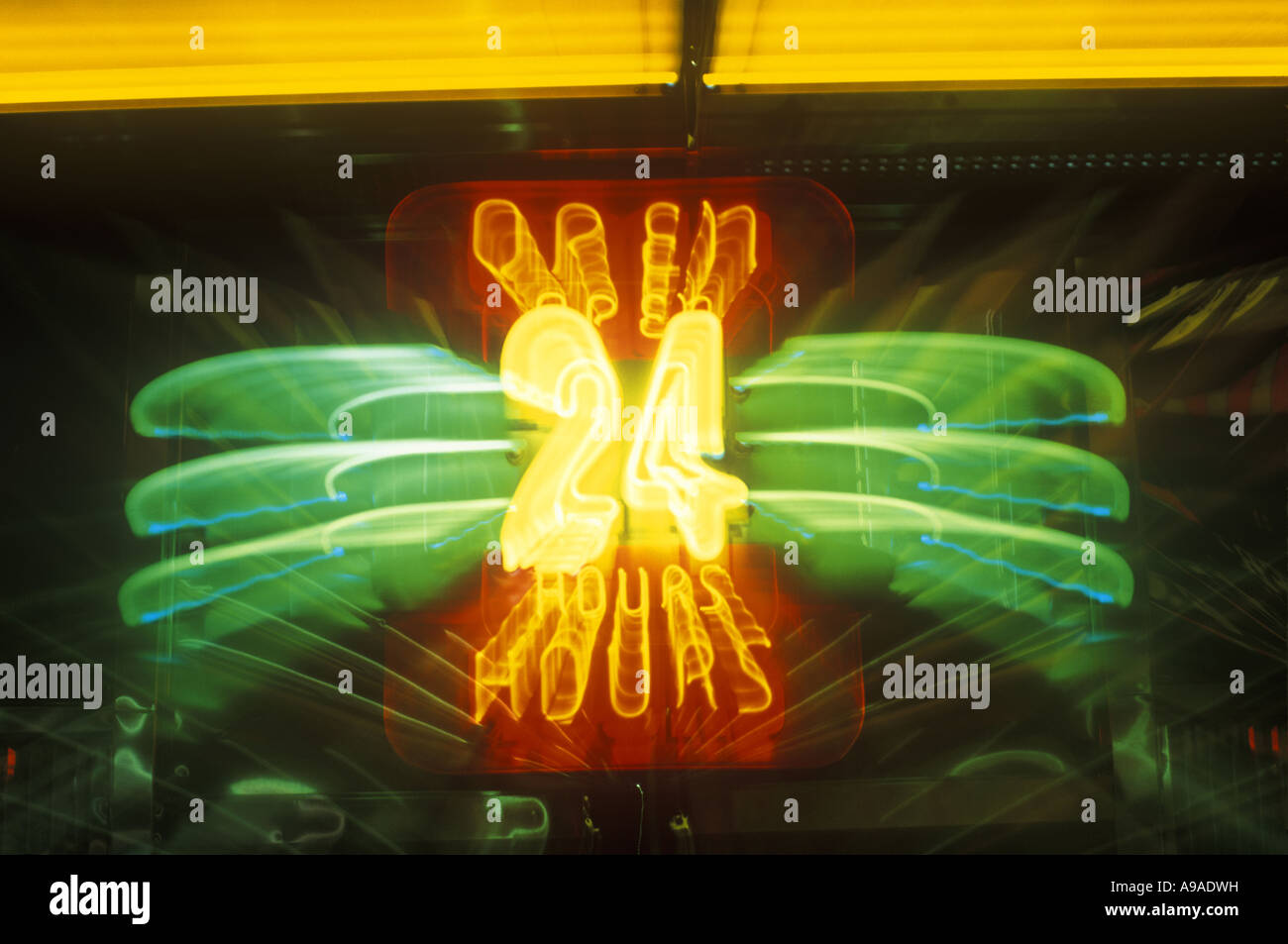 ZOOMED OPEN 24 HOURS NEON SIGN Stock Photo - Alamy
