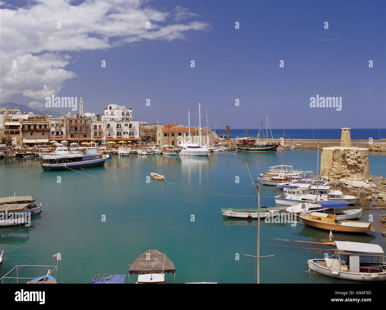 North Cyprus Kyrenia Harbour with fishing boat on water Stock Photo - Alamy