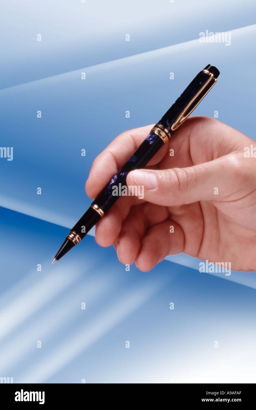 Hand with pen writing on paper document Stock Photo - Alamy