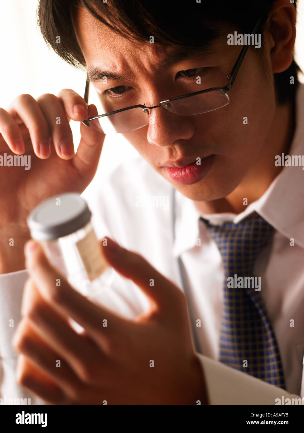 medic with case notes doctor sample Stock Photo - Alamy