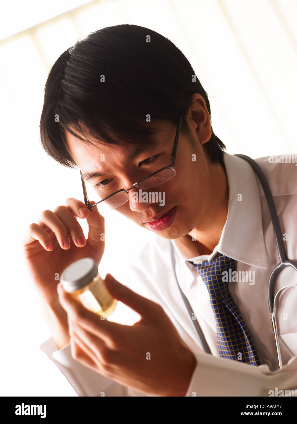 medic with case notes doctor sample Stock Photo - Alamy