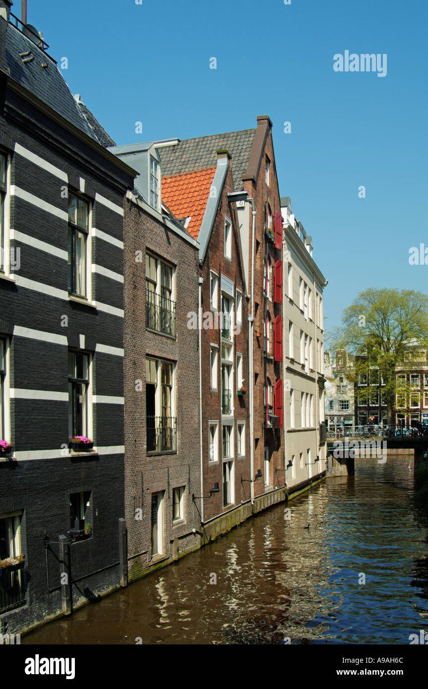 Traditional canalside buildings in central Amsterdam Netherlands ...