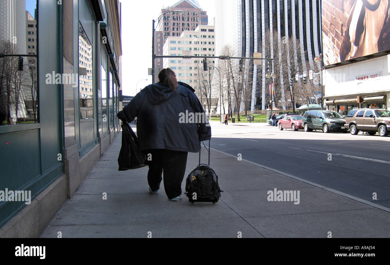 Heavy set woman on street Stock Photo - Alamy