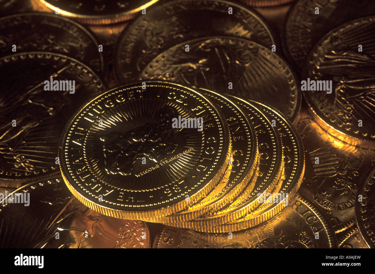 STACK OF GOLD COINAGE Stock Photo - Alamy