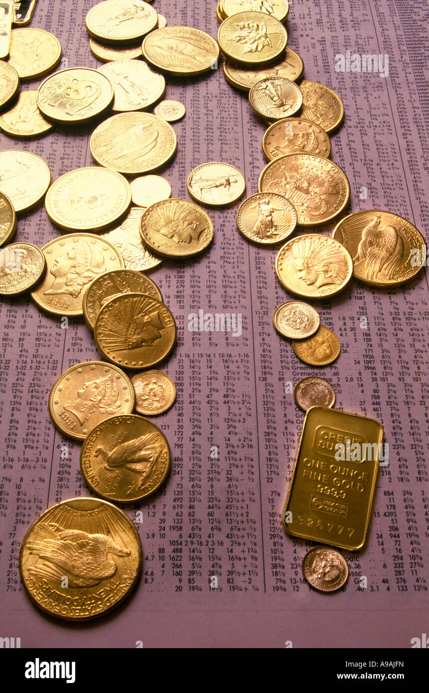 GOLD COINAGE ON FINANCIAL TIMES NEWSPAPER PAGE Stock Photo - Alamy