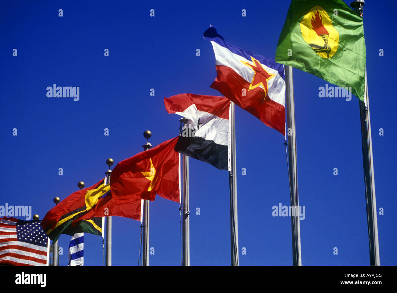 NATIONAL FLAGS FLYING ON FLAGPOLES IN ROW Stock Photo - Alamy
