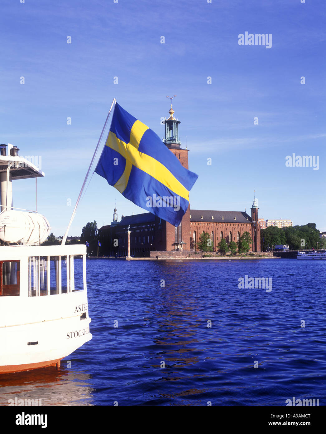 SWEDISH NATIONAL FLAG CITY HALL STOCKHOLM SWEDEN Stock Photo - Alamy