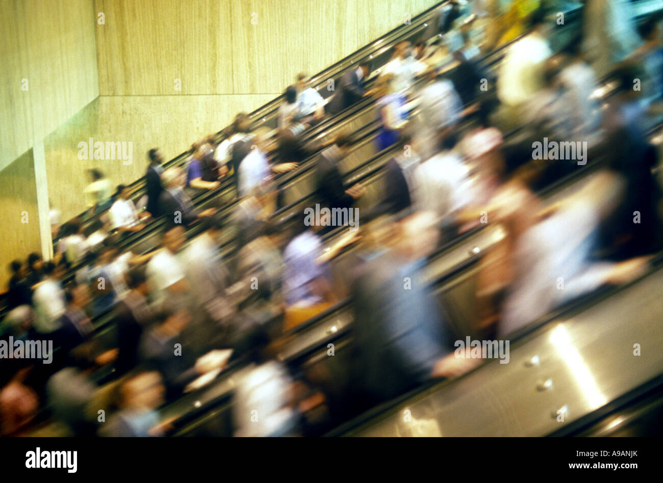 CROWD OF COMMUTERS ON ESCALATORS Stock Photo - Alamy
